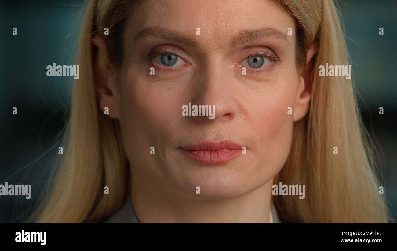 Serious Caucasian adult middle-aged businesswoman executive posing for business portrait in ...