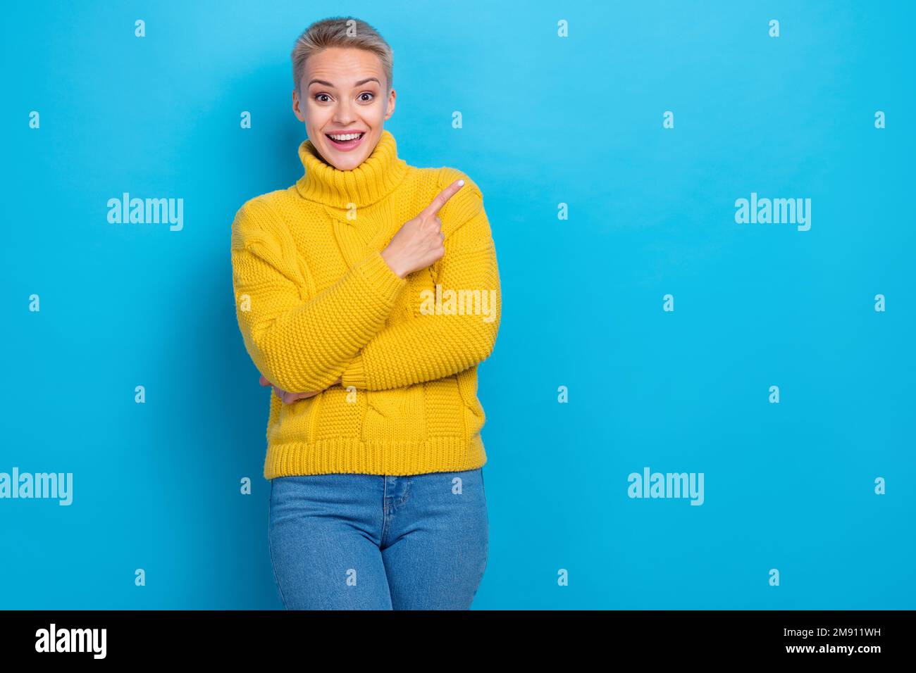 Photo of excited funky girl dressed knitwear pullover pointing finger ...