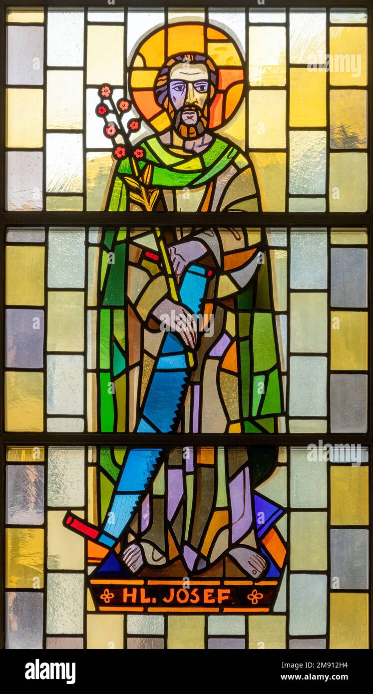 TASCH, SWITZERLAND - JULY 2, 2022: The stained glass with the St ...