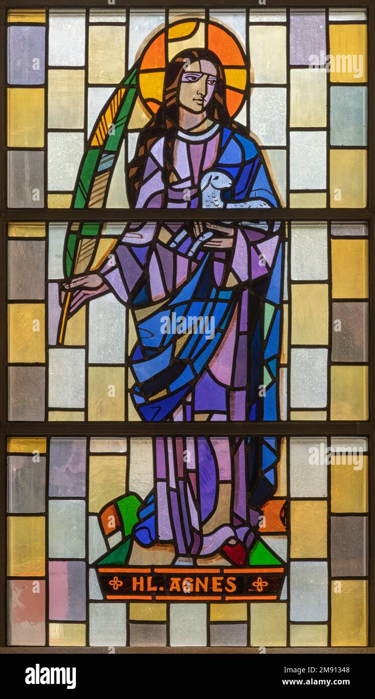 TASCH, SWITZERLAND - JULY 2, 2022: The stained glass with the St. Agnes ...