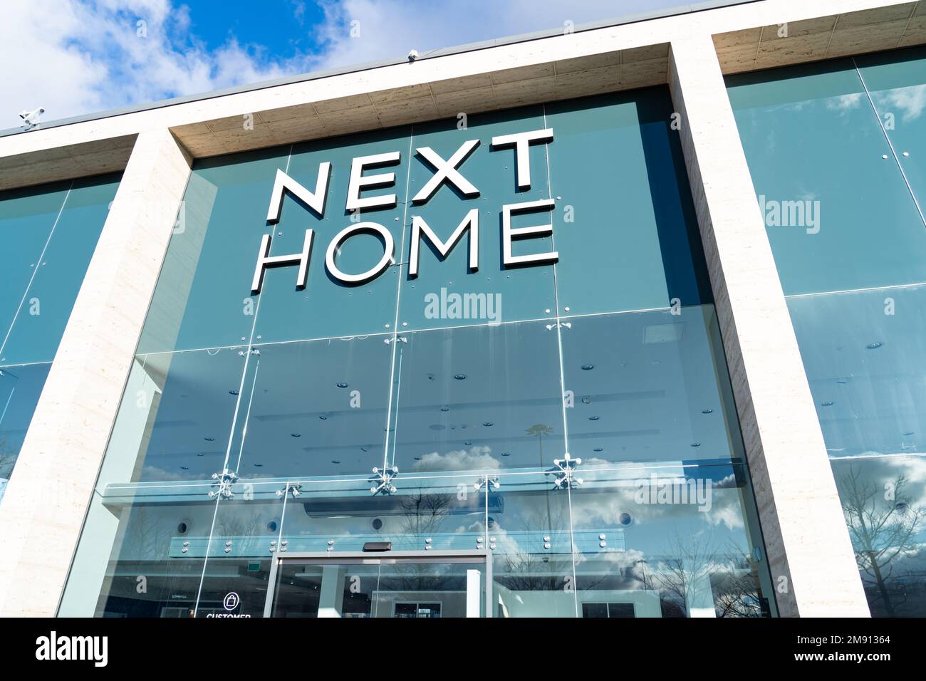 Exterior Signage of the Next clothing and homeware store in the Merry ...