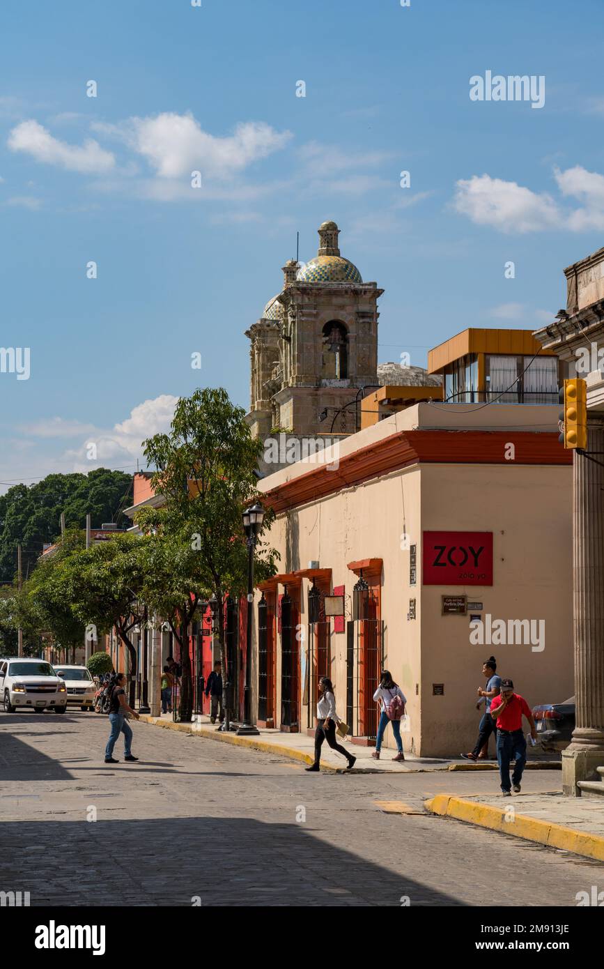 A street scene in the historic center of Oaxaca, Mexico, with the San ...