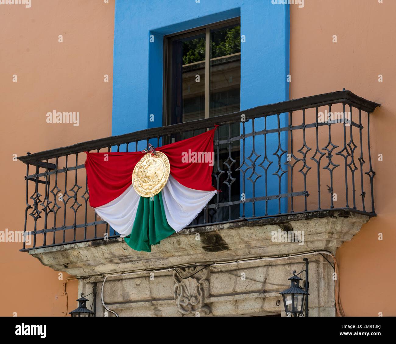 Mexican flag banner on a building to celebrate Mexican Independence Day ...