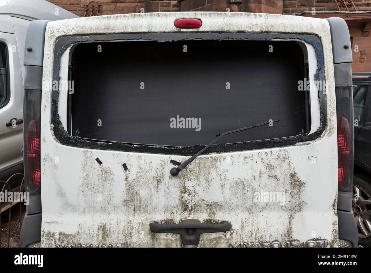 Van with a broken rear window, UK, Europe Stock Photo - Alamy