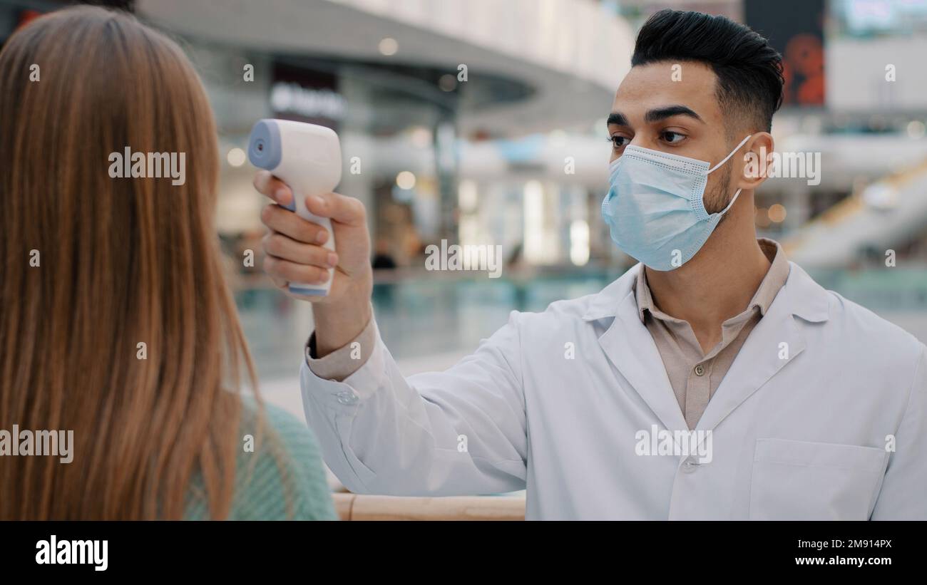 Doctor man male ethnic Indian medical worker face in mask lab coat ...