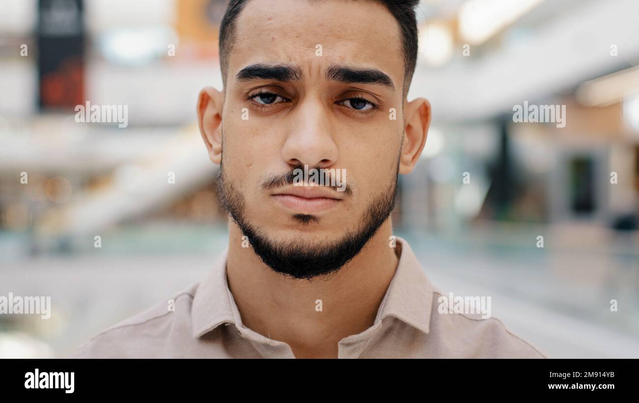 Close-up of face upset young man sad frustrated millennial guy looking ...