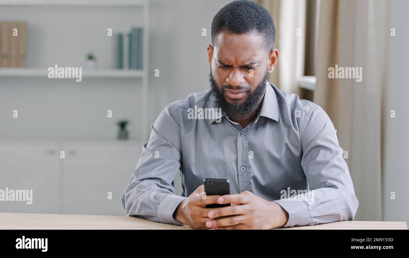 African man frustrated failure sitting hi-res stock photography and ...