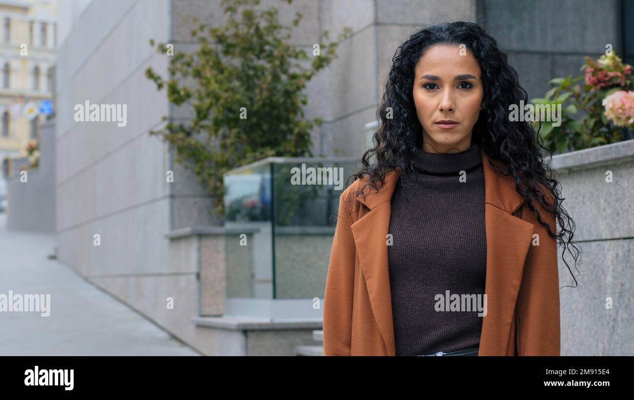 Female portrait beautiful latin business woman look over shoulder young ...