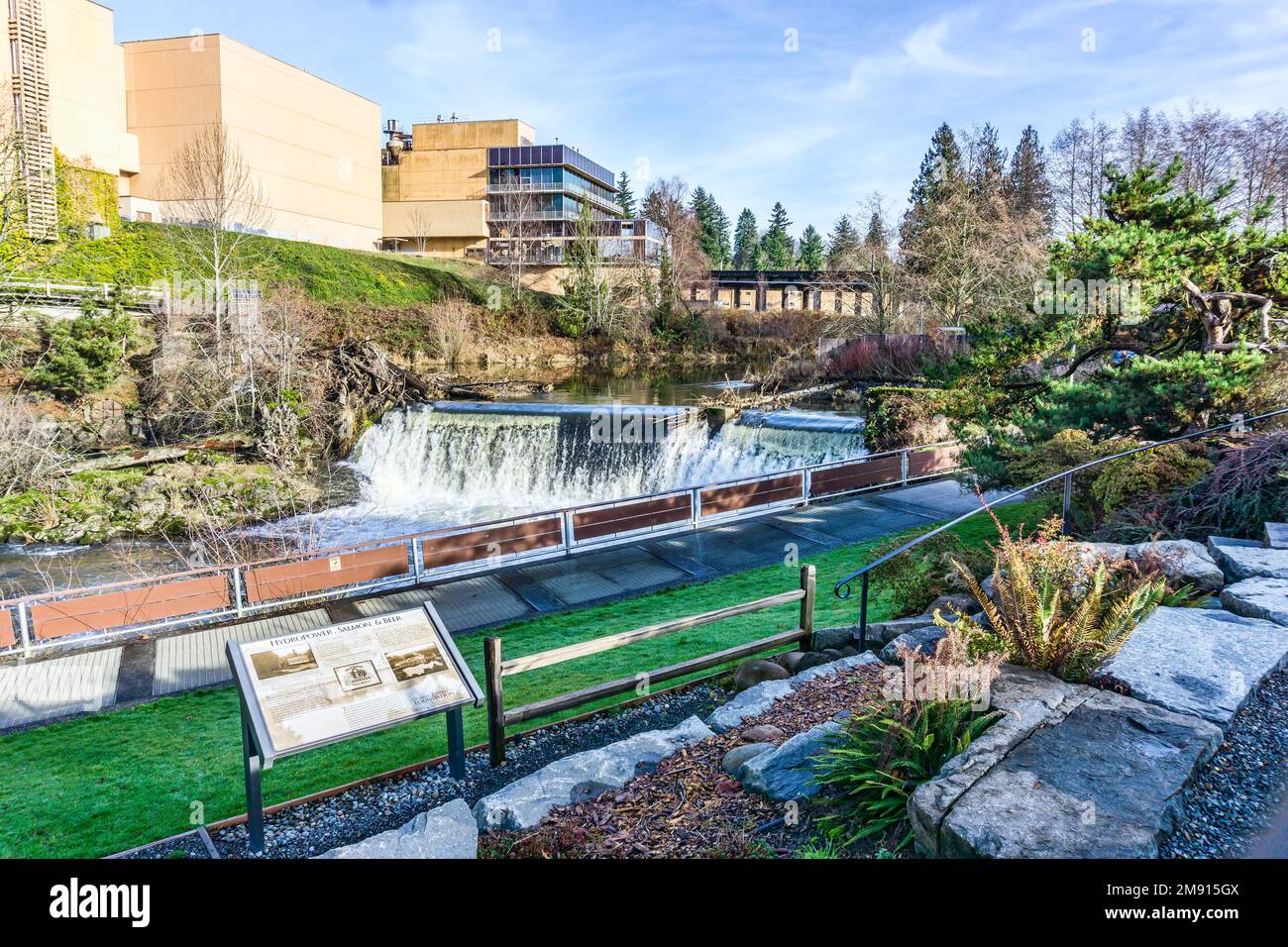 A view of Brewery Park with one of the waterfalls of Tumwater Falls ...