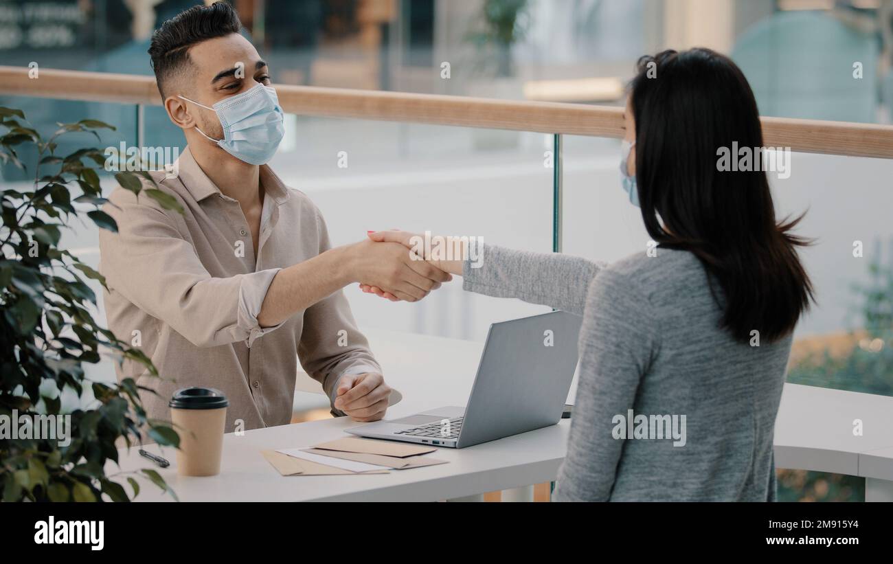 Man bank worker insurance agent man in medical mask advises consulting ...