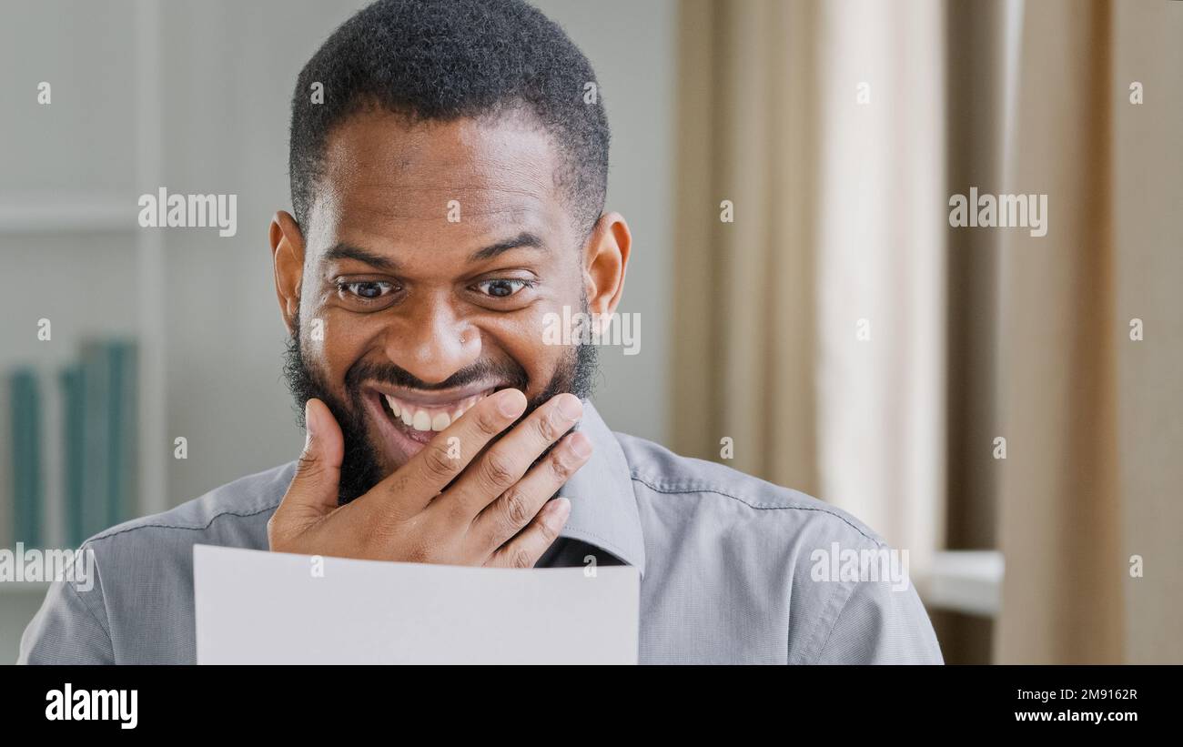 Surprised shocked ethnic winner man excited wonder male executive ...