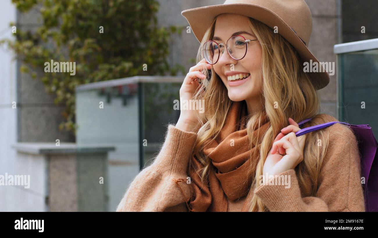 Portrait 20s girl answer phone call Caucasian female shopper buyer ...