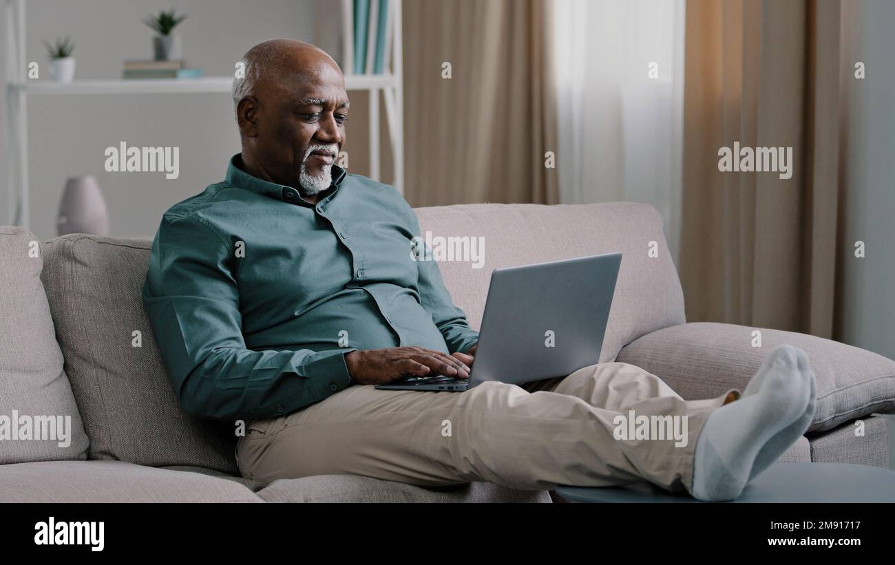 African bald overweight obese old middle-aged man senior businessman ...