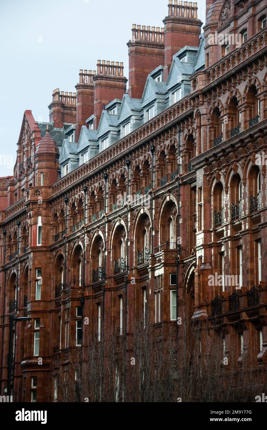 Around the UK - Sunlight catching the brown terra cotta façade of the ...