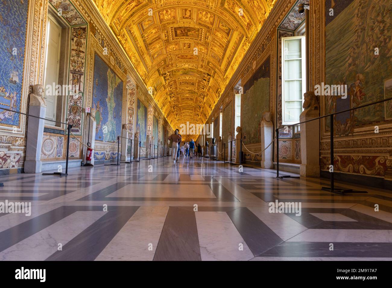 Vatican city museum. Gallery of maps. Hall with marble floor and gold ...