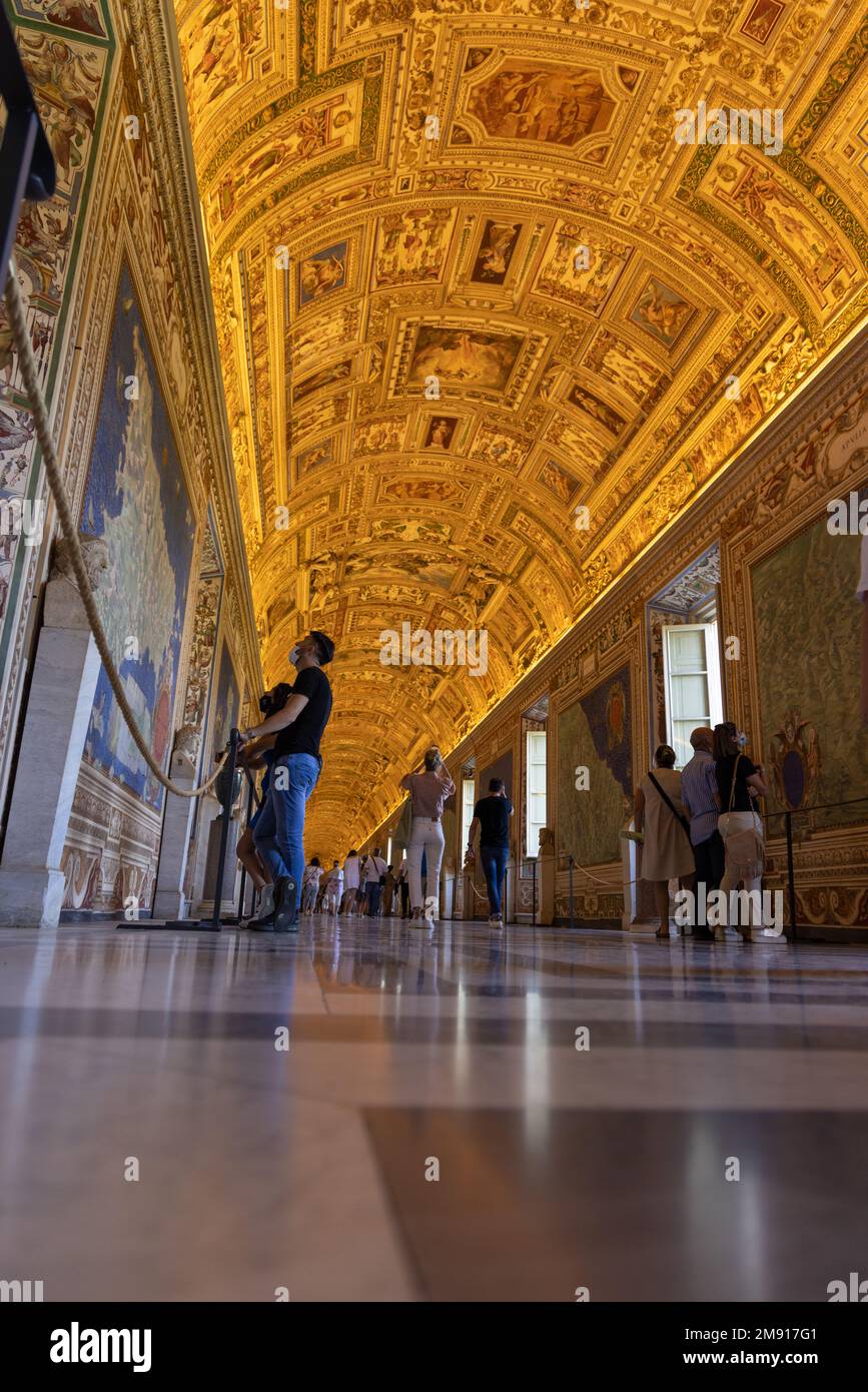 Vatican city museum. Gallery of maps. Hall with marble floor and gold ...