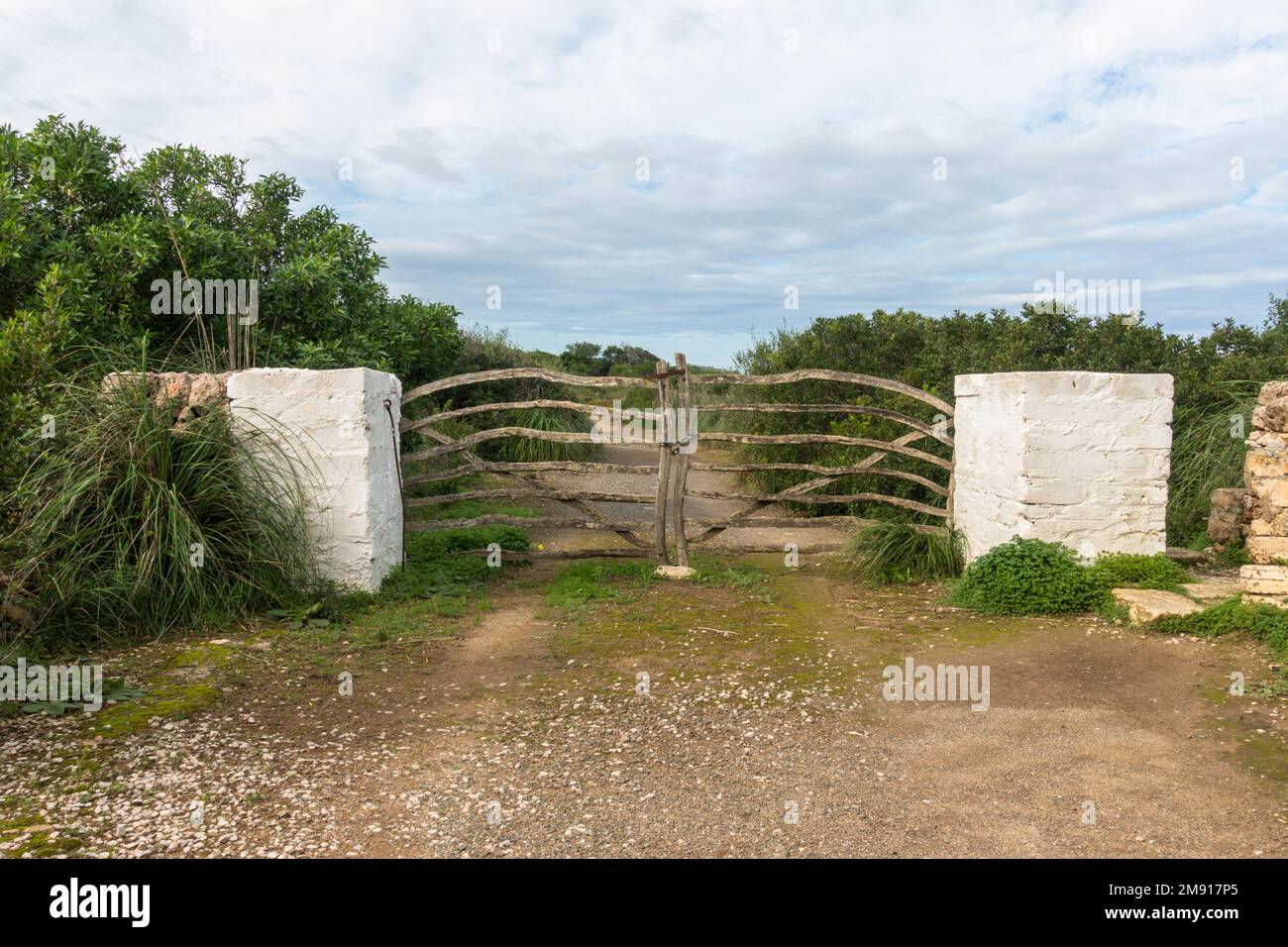 Typical minorcan wooden gate, at entrance of Albufera des Grau Nature ...