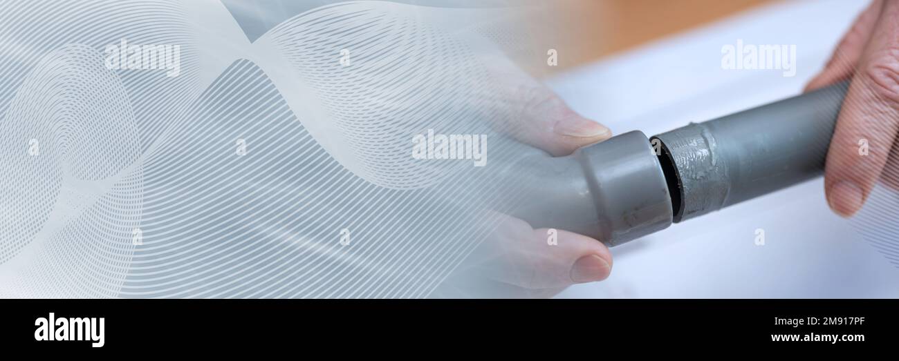 Plumber joining pvc pipe and fitting; panoramic banner Stock Photo - Alamy