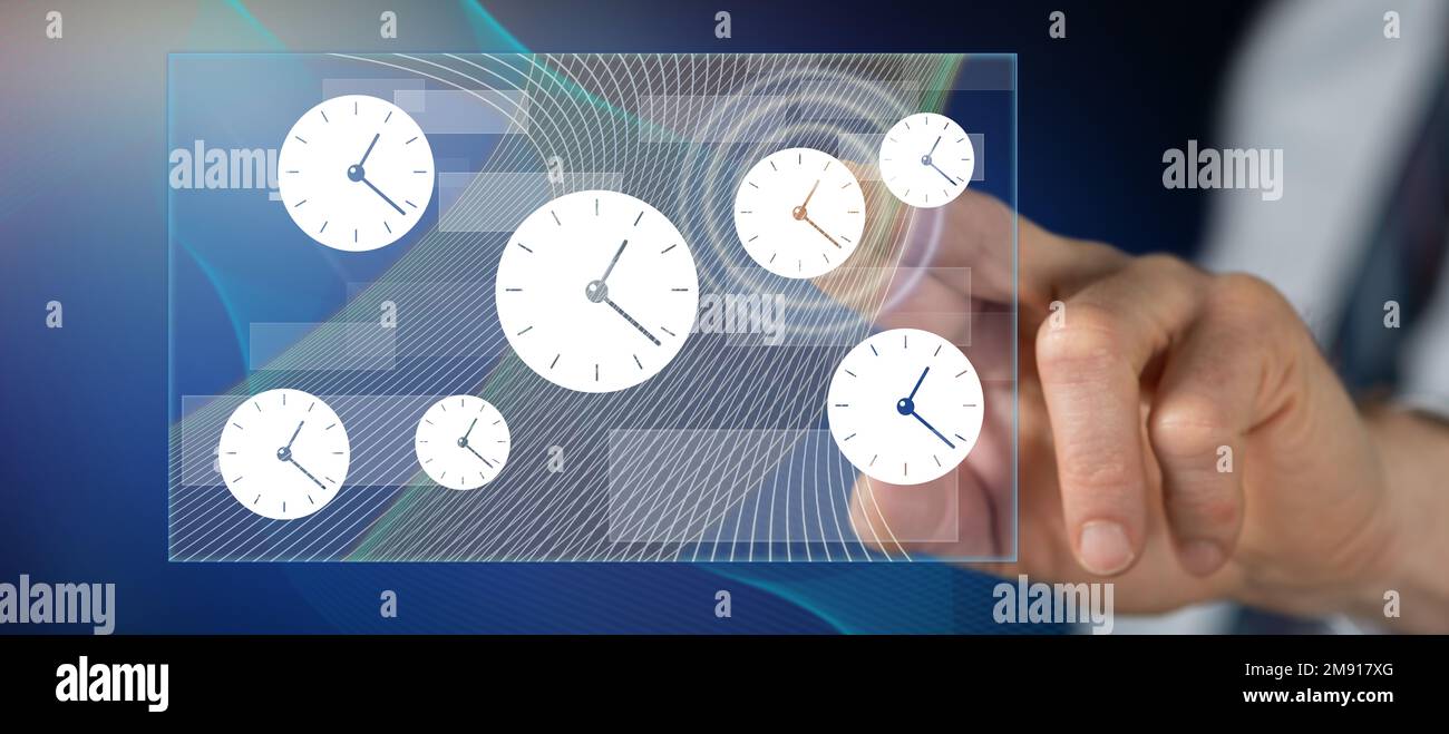Man touching a time management concept on a touch screen with his ...