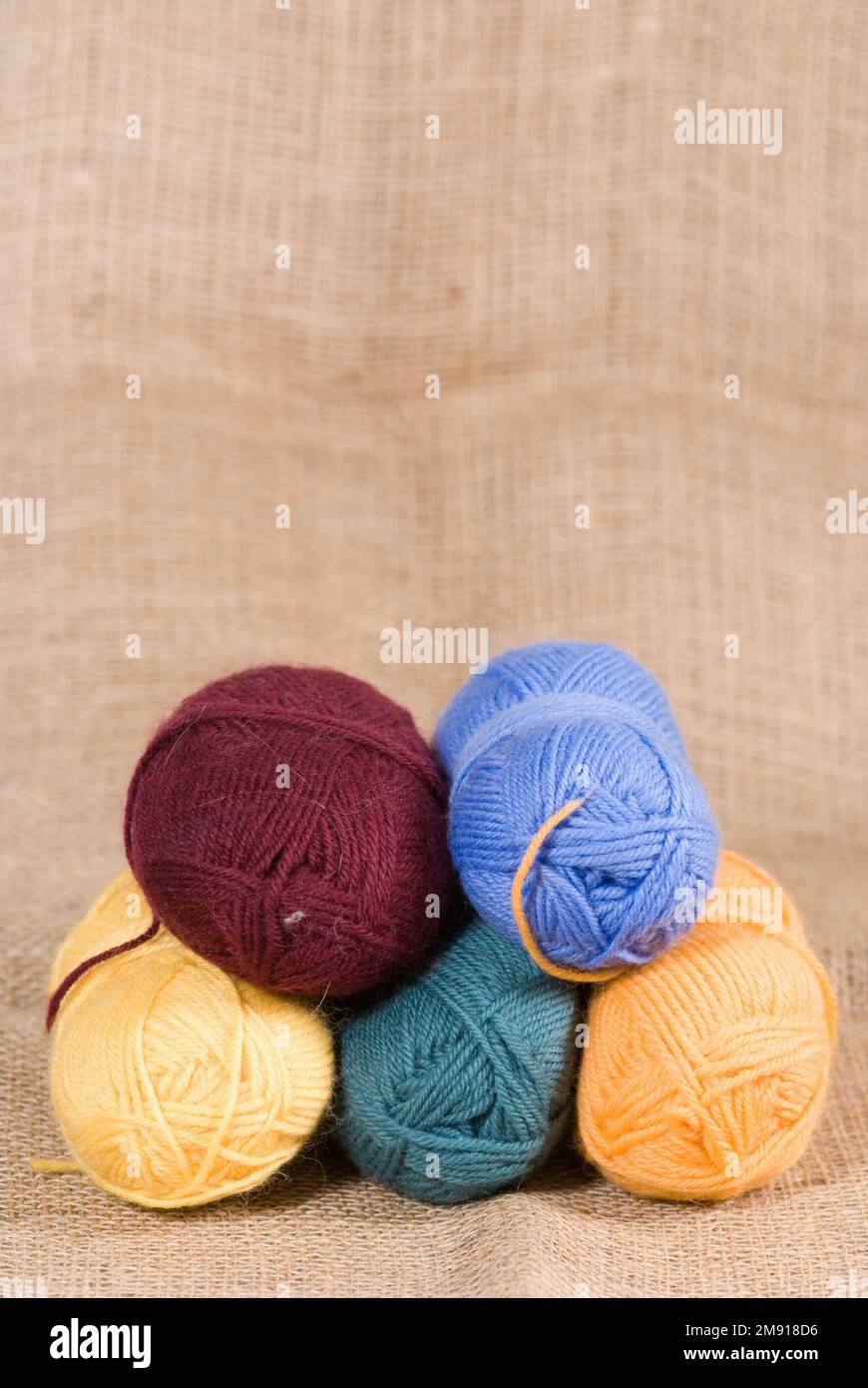 Different colors balloons of yarn threads Stock Photo - Alamy