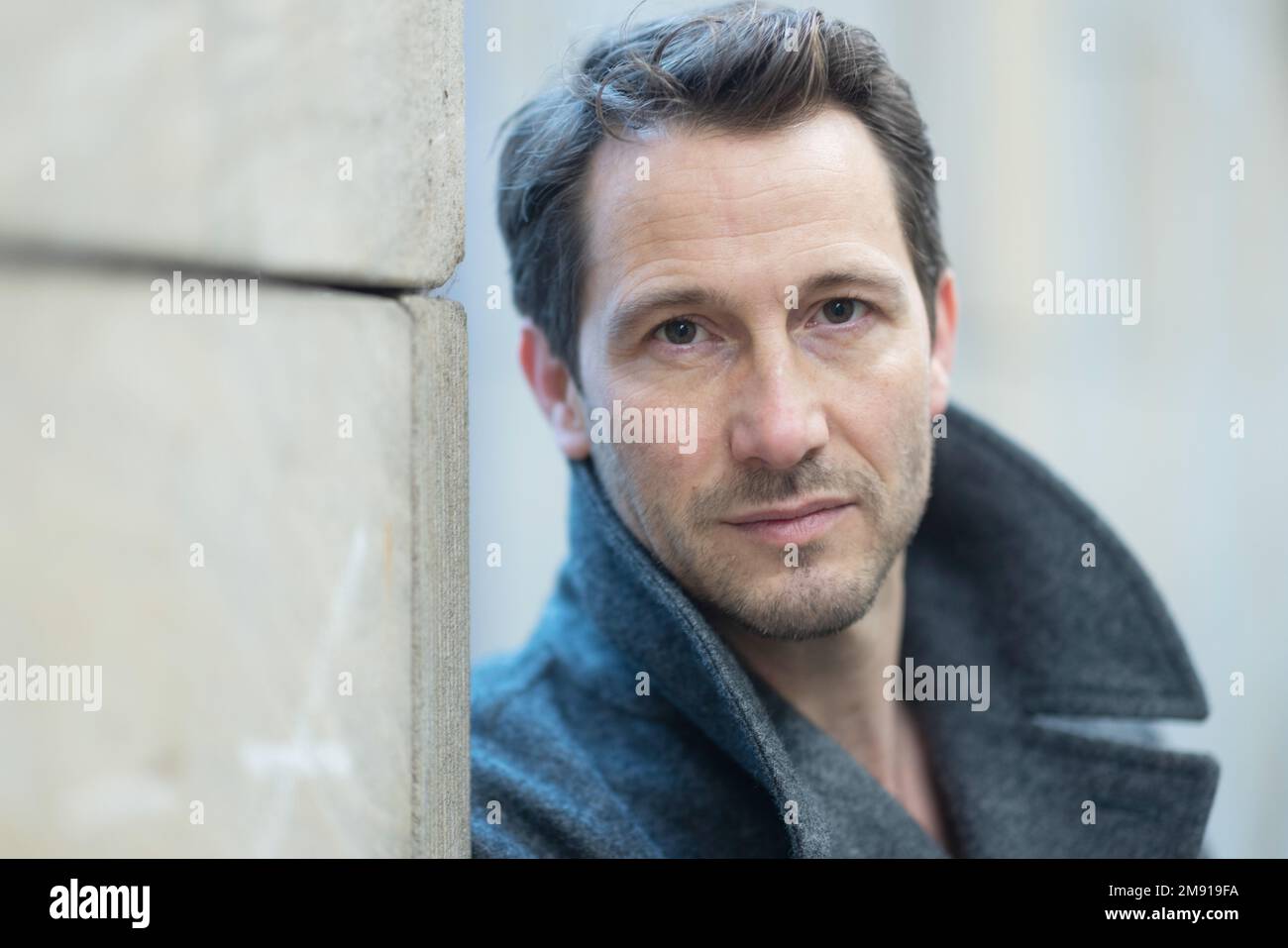 PRODUCTION - 16 January 2023, Hessen, Frankfurt/Main: Actor David Rott ...