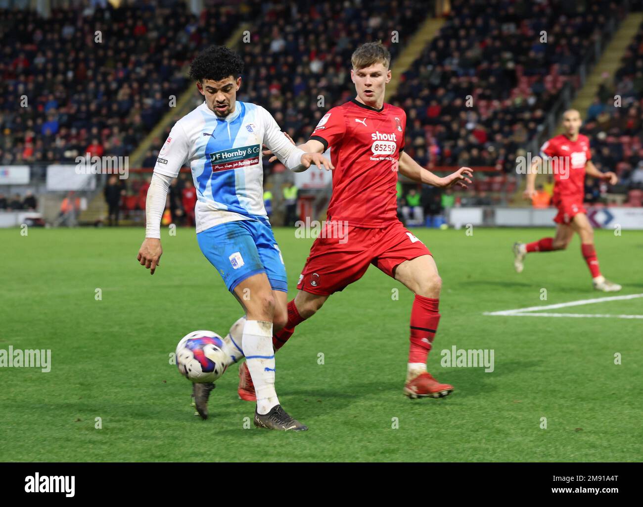 L-R Josh Gordon of Barrow holds of Ed Turns (on loan from Brighton ...