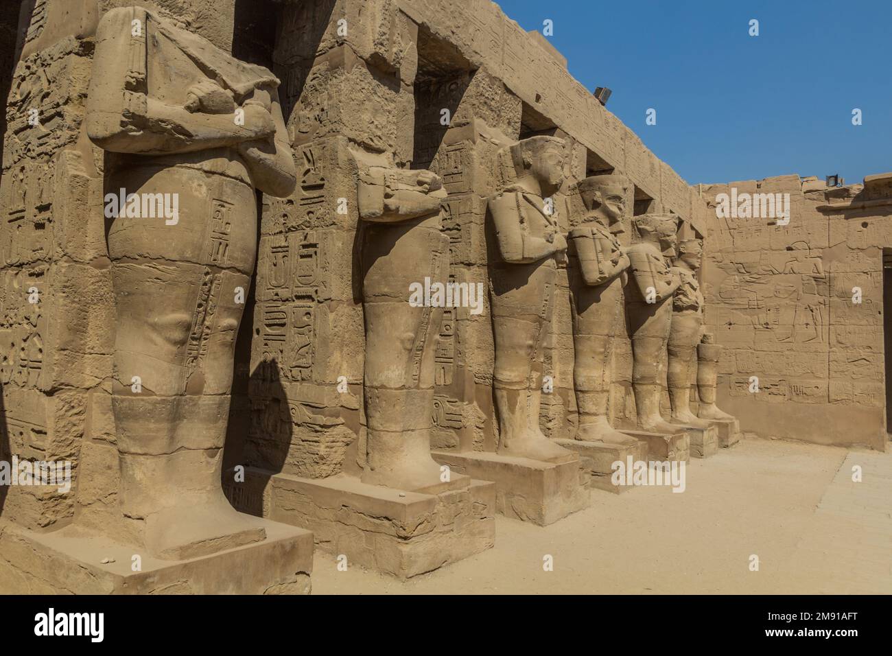 Pharaoh statues in the Amun Temple enclosure in Karnak, Egypt Stock ...