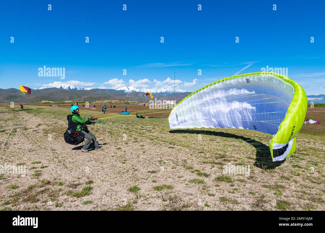Patrick Mcfarland launching his paraglider at Point of the Mountain ...
