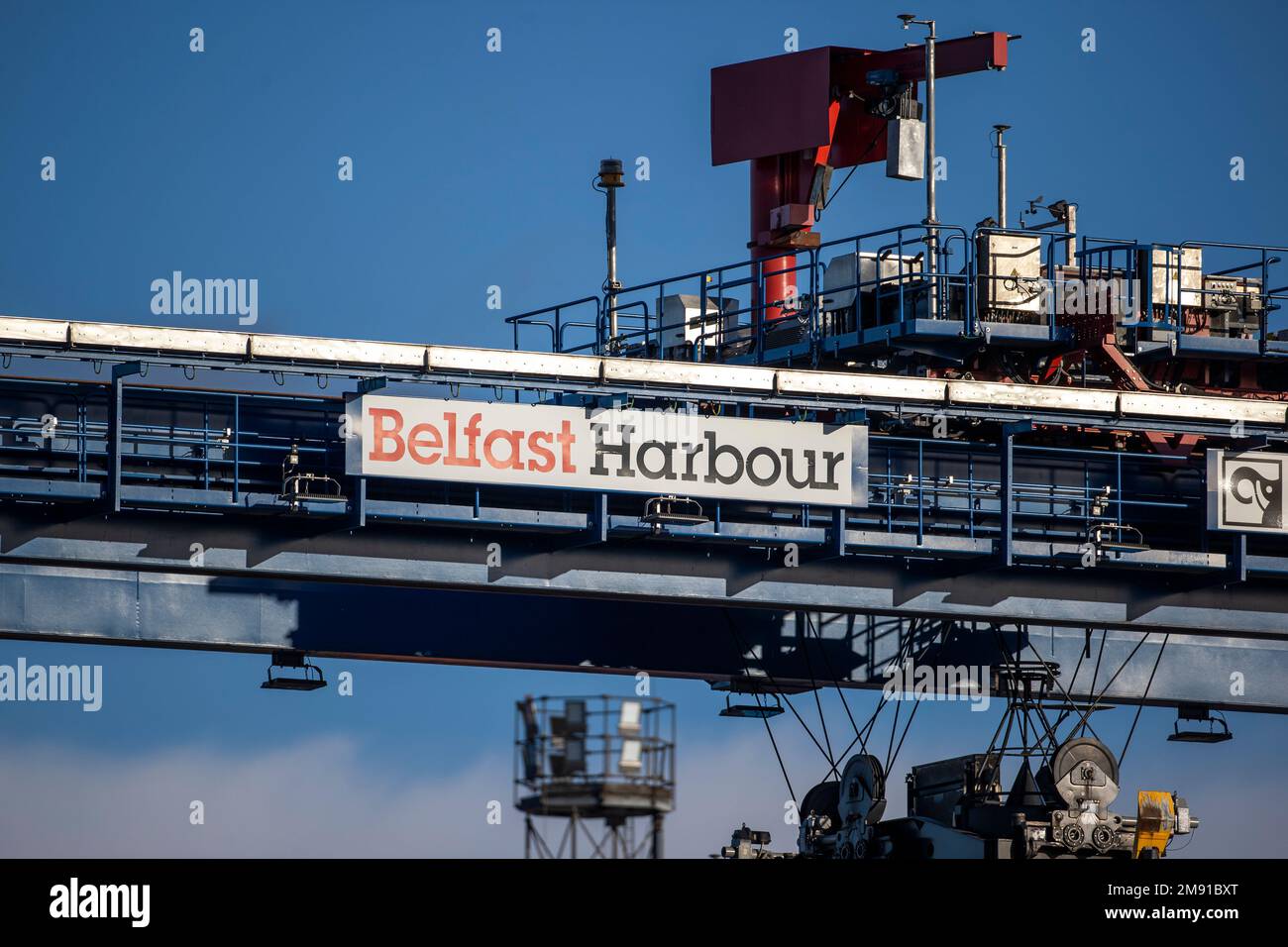 A general view of a Belfast Harbour sign on a container crane at at the ...