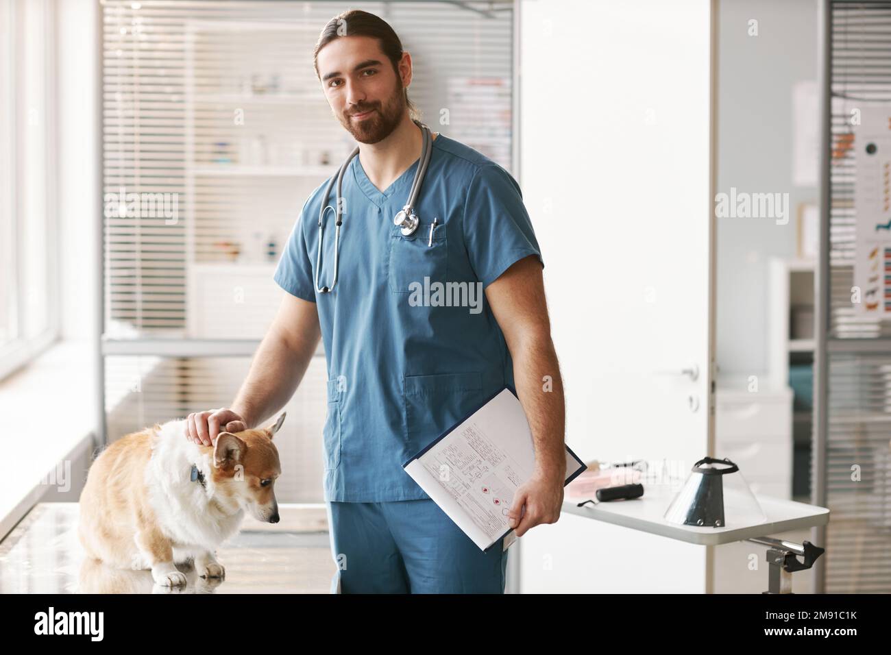 Happy vet man look camera hi-res stock photography and images - Alamy