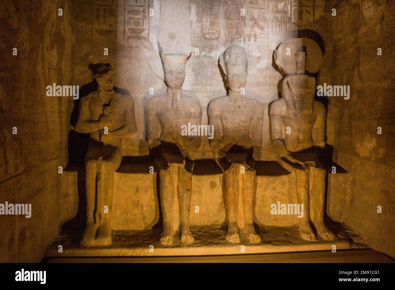 Statues of Ptah, Amun Ra, king Ramesses II and Ra-Horakhty illuminated ...