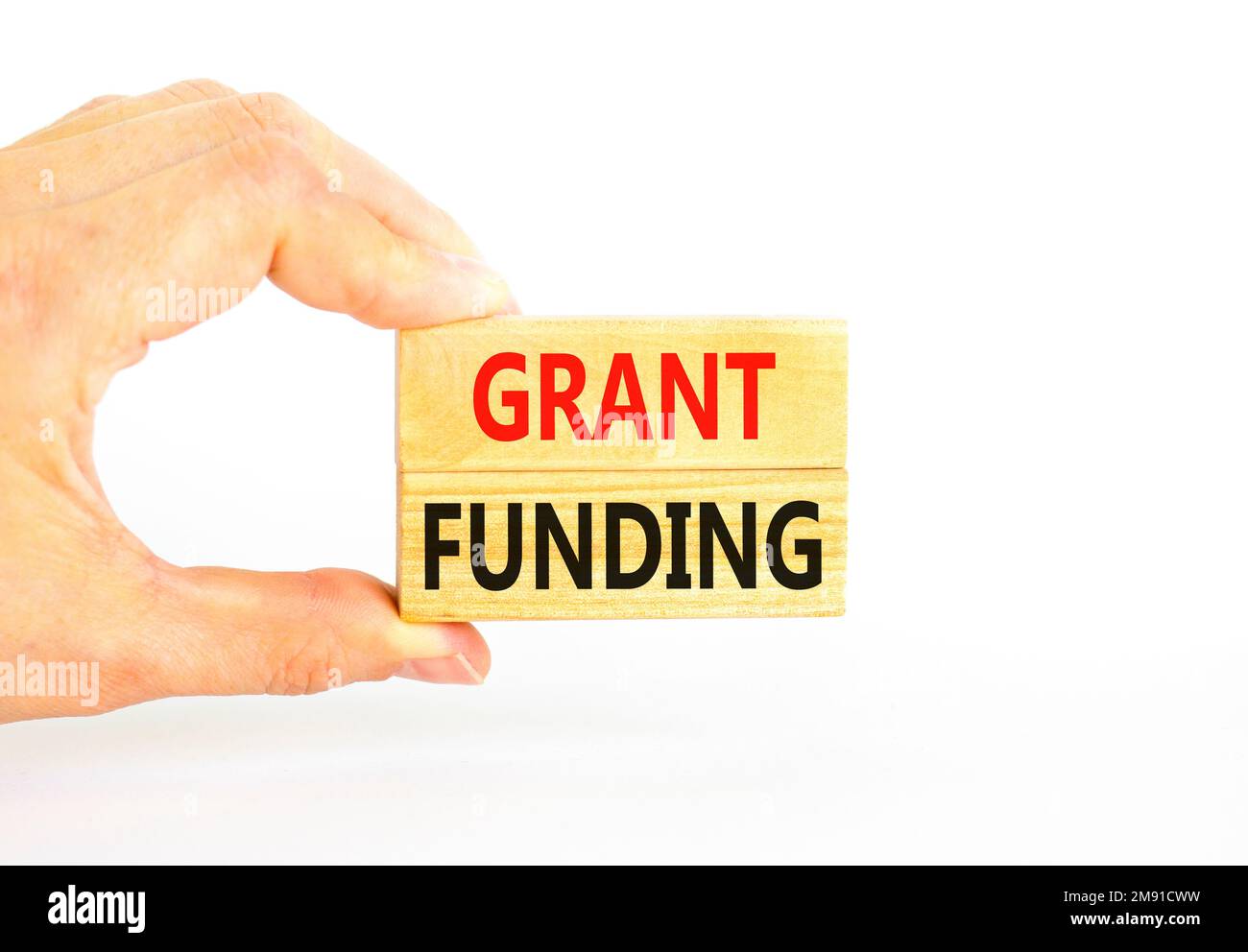 Grant funding symbol. Concept words Grant funding on wooden blocks ...