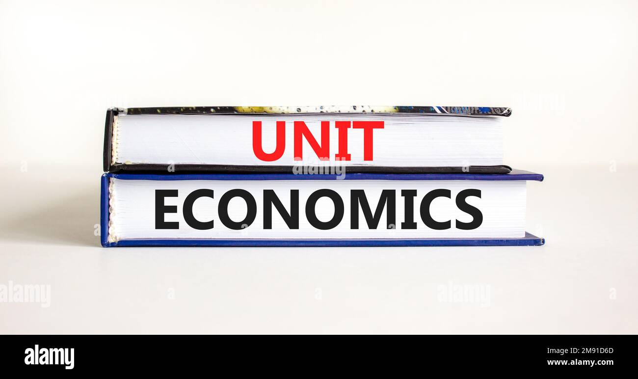 Unit economics symbol. Concept words Unit economics on books. Beautiful ...