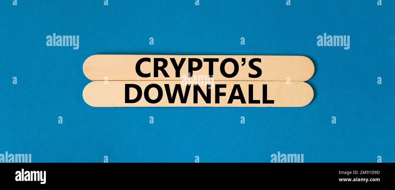 Crypto downfall symbol. Concept words Cryptos downfall on wooden stick ...