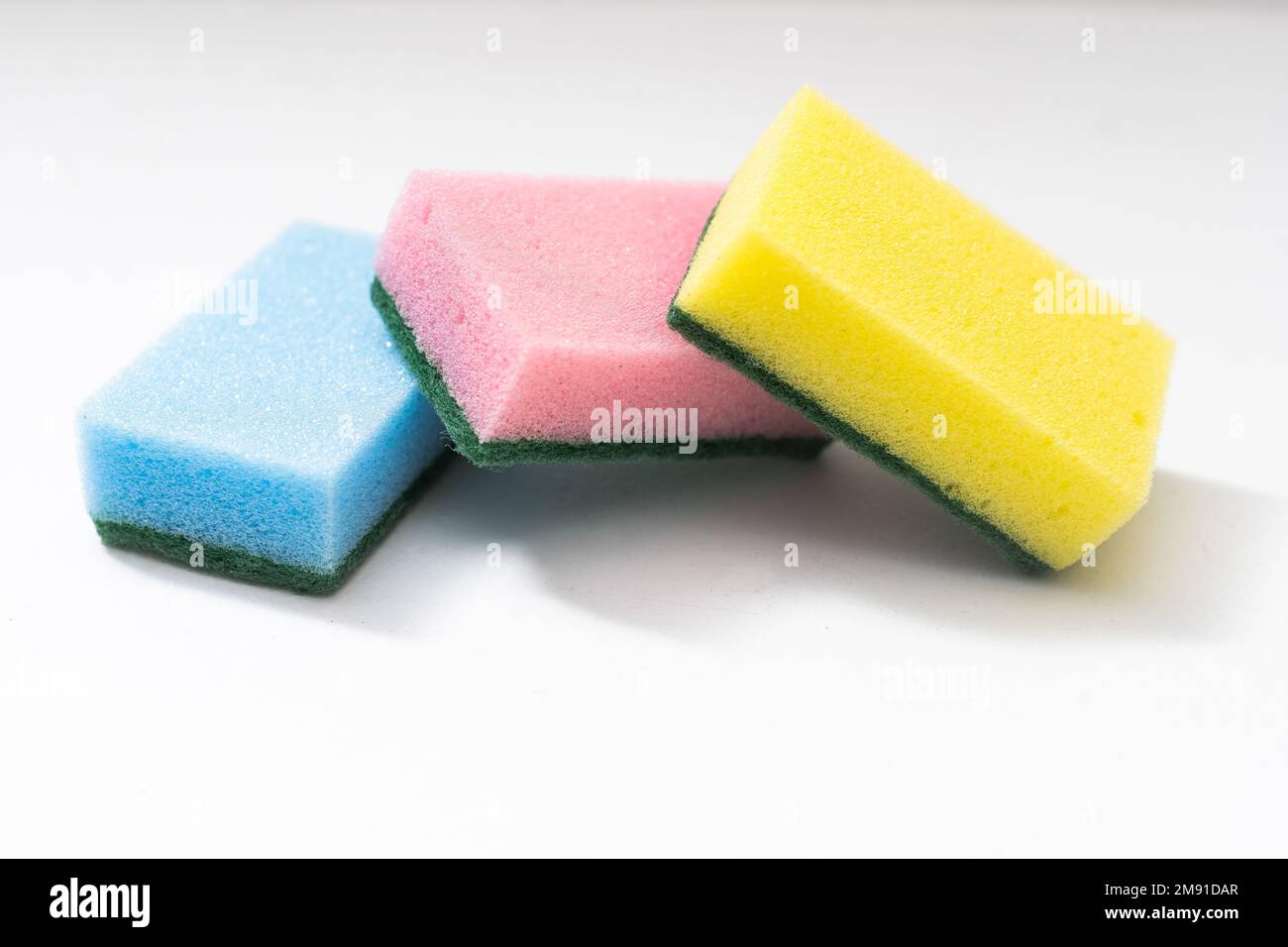 Kitchen dishcloth, cleanup concept, housework. Colorful kitchen sponges ...