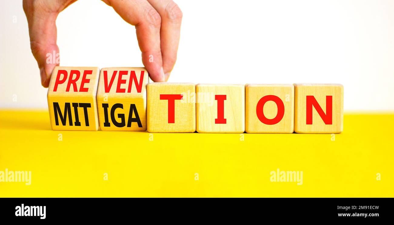 Prevention or mitigation symbol. Businessman turns cubes and changes ...