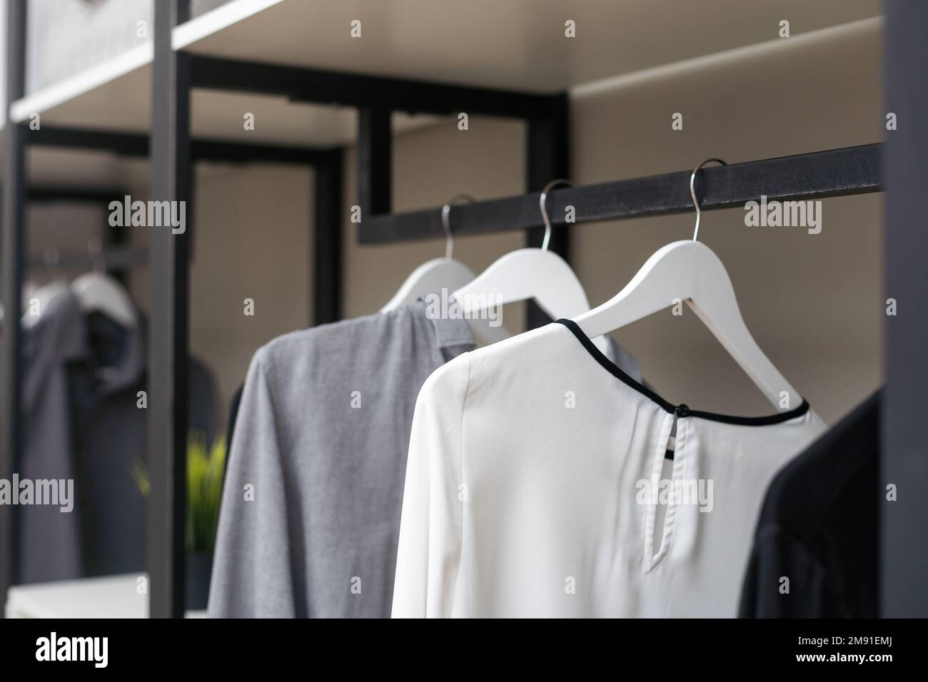 Front view of modern and large wardrobe in dressing room with ...