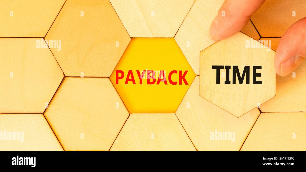 Payback time symbol. Concept words Payback time on wooden puzzles ...