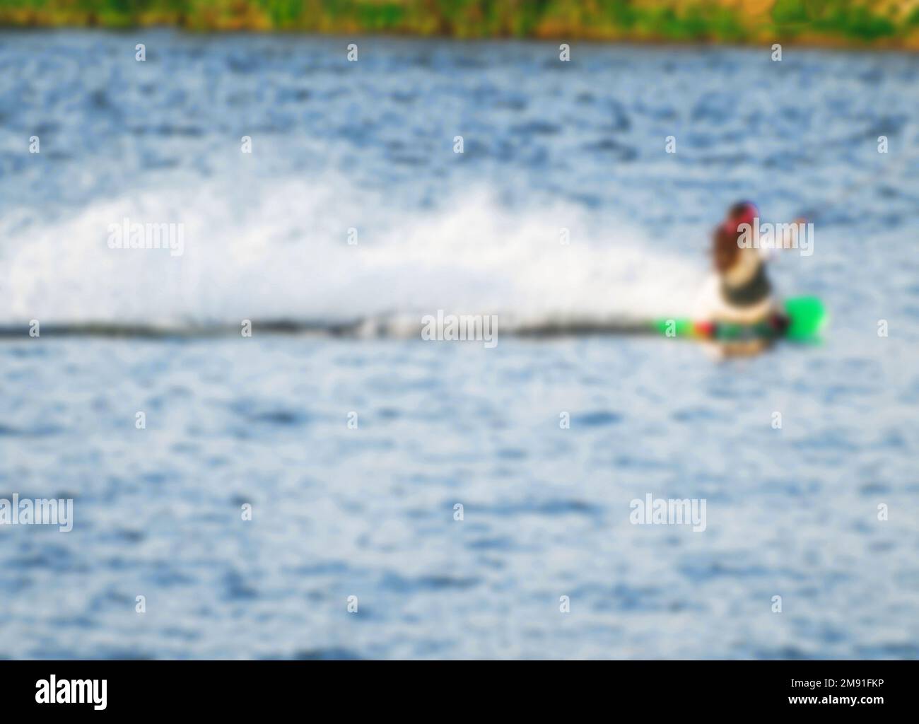 cable wakeboarding, wakesurfing at cable wake park. defocused ...
