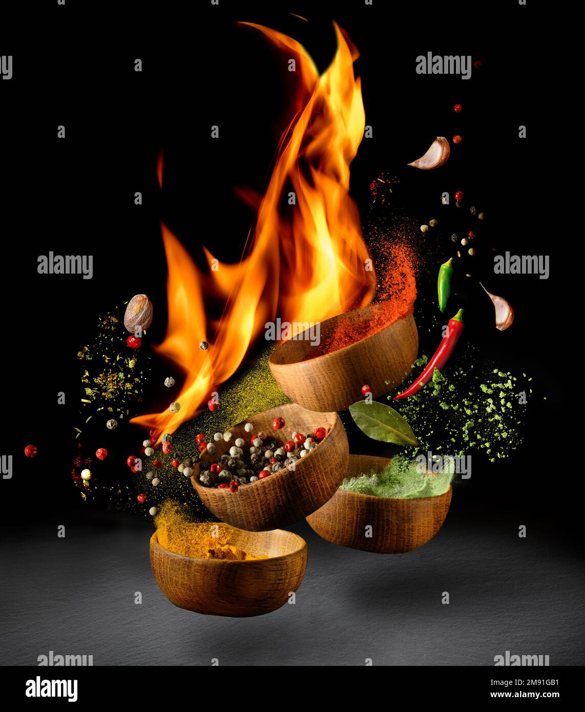 Hot Spices and seasonings powder splash, explosion on black background ...