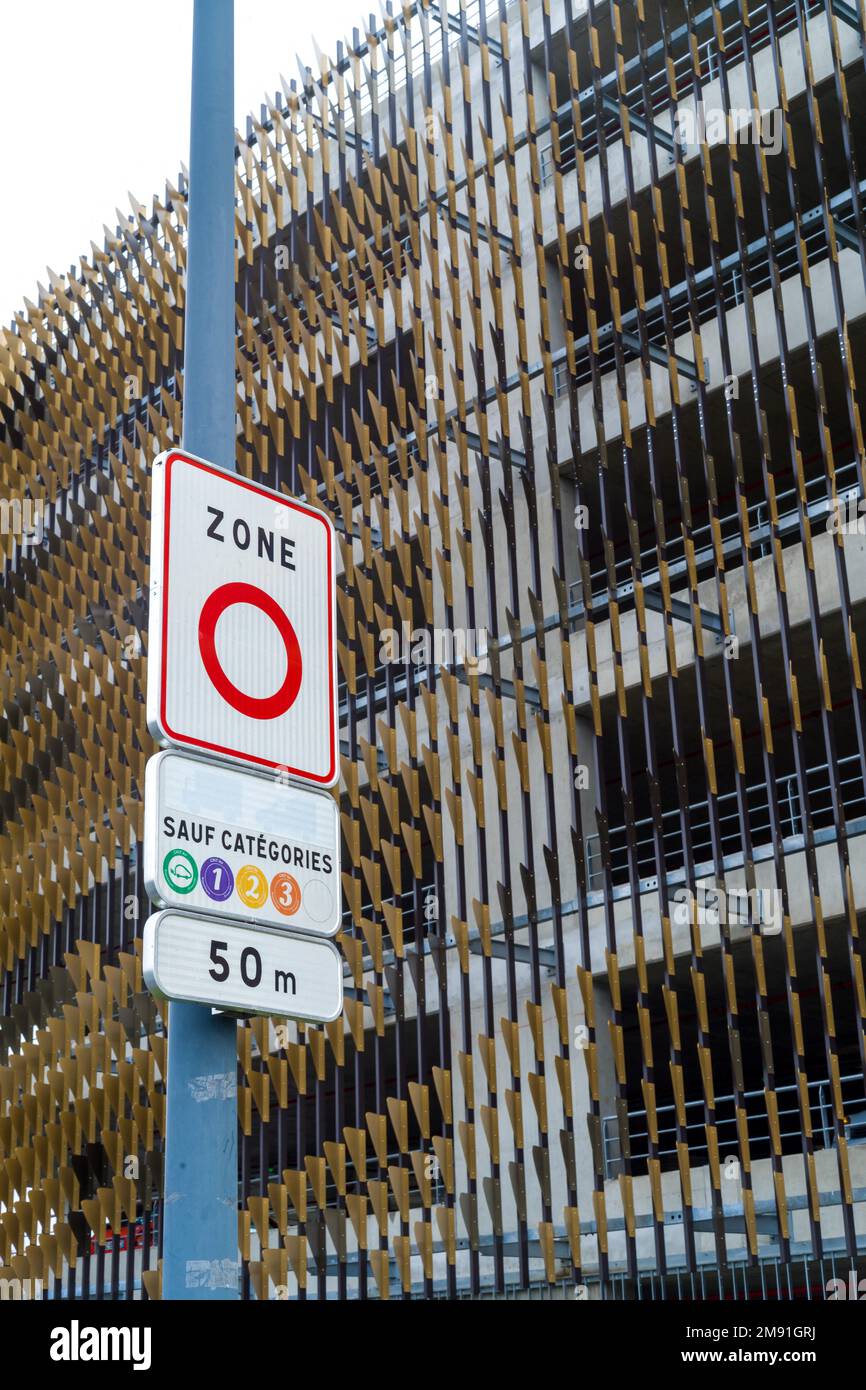 ZFE Traffic sign with the new Basso-Cambo park-and-ride facility in the ...