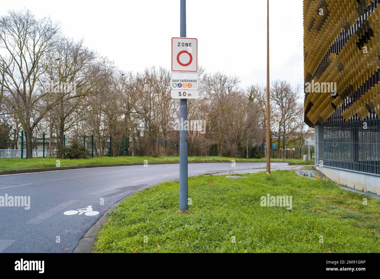 ZFE Traffic sign with the new Basso-Cambo park-and-ride facility in the ...