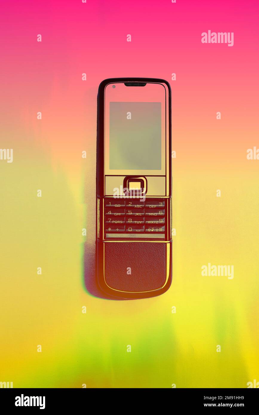 Old mobile phone in thermography gradients. retro, vintage and ...