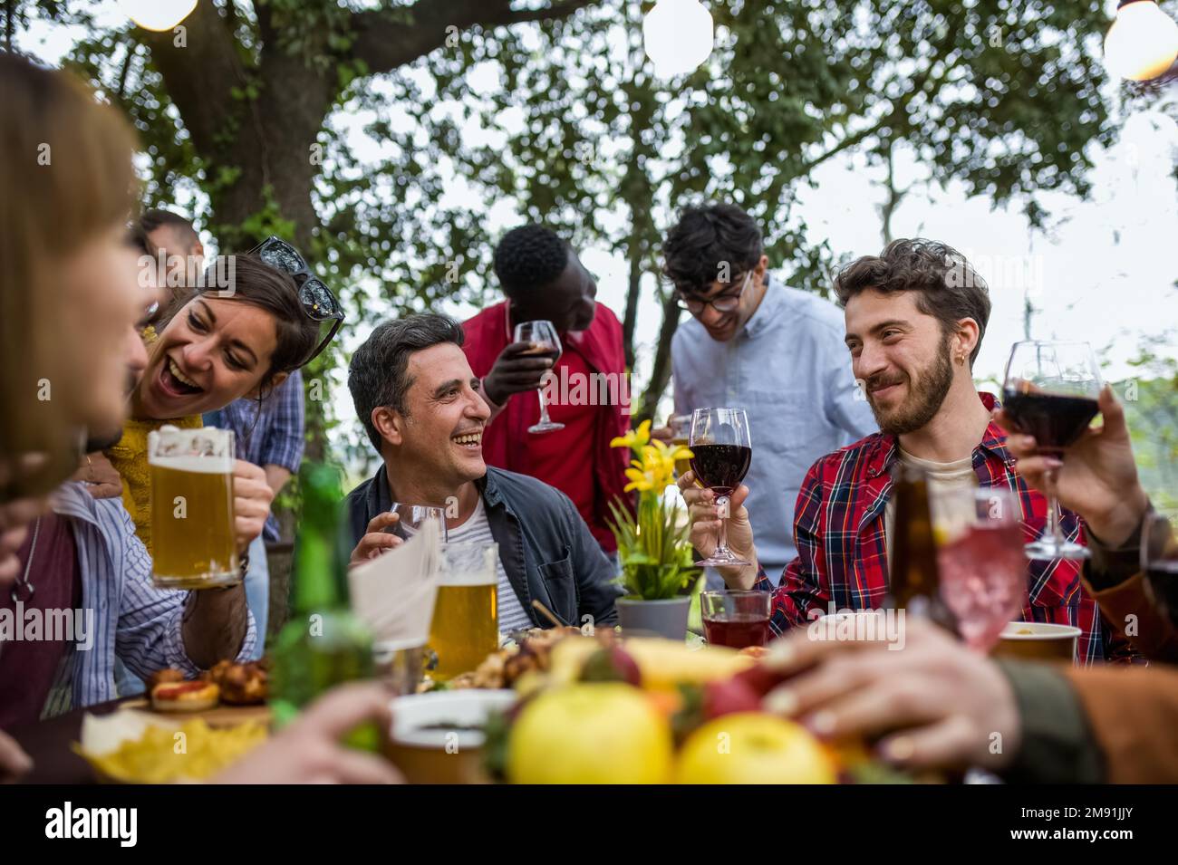 happy birthday party with multicultural family Stock Photo - Alamy