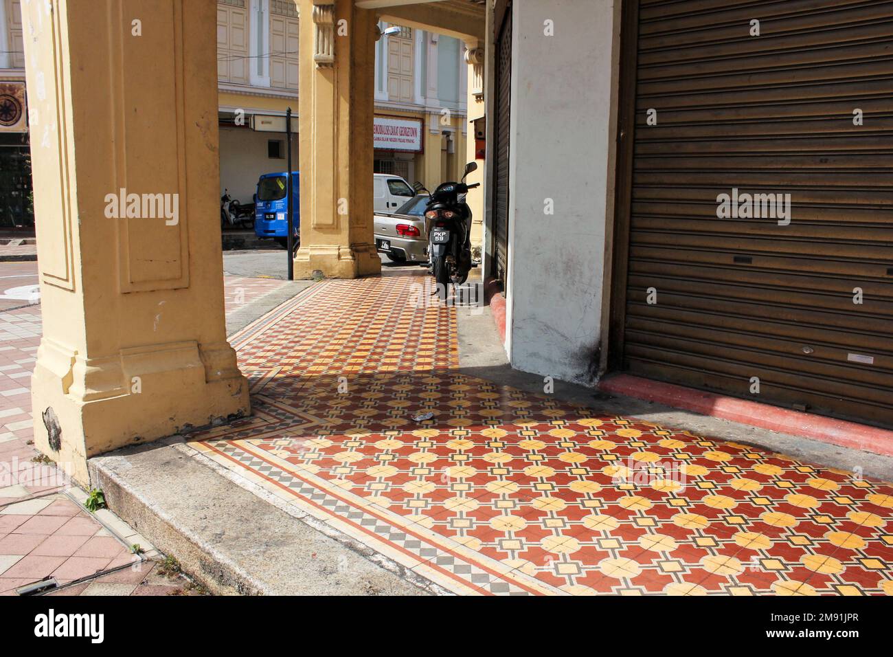Georgetown, Penang, Malaysia - November 2012: A vintage sidewalk alley ...