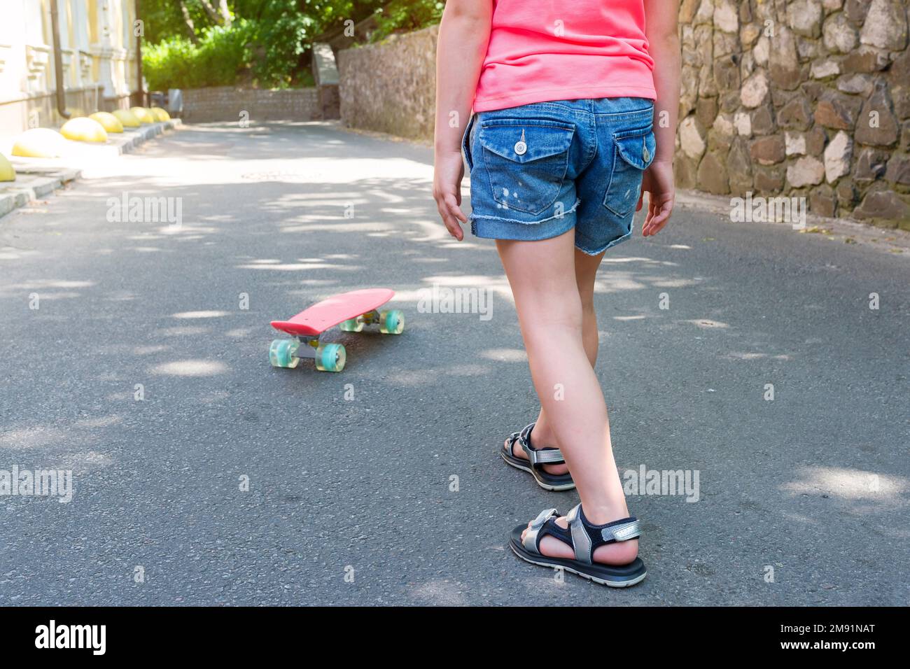 A child's legs and a skateboard, a close-up. A sport lifestyle Stock ...