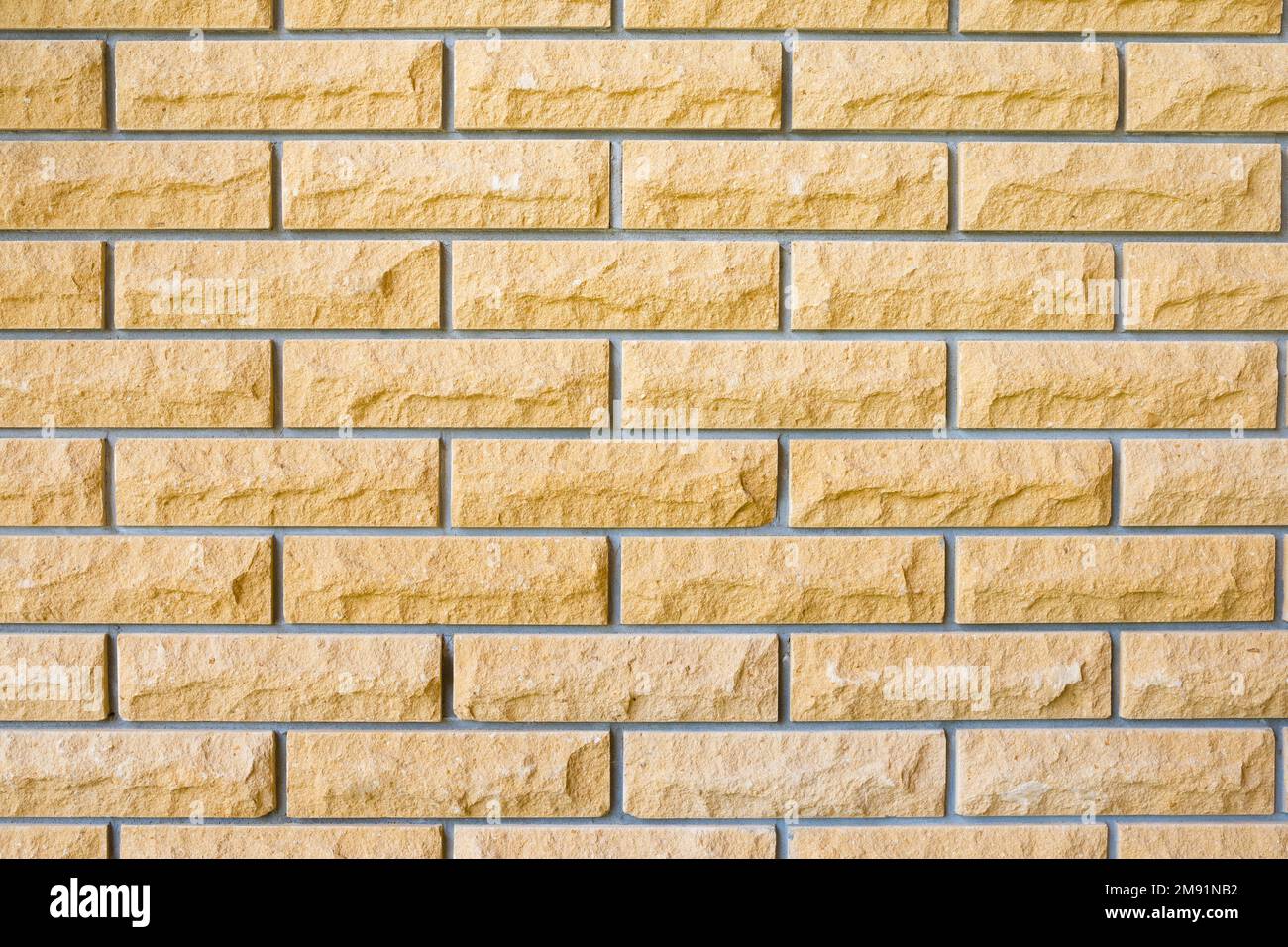 Yellow brick wall closeup. Bright brick background Stock Photo - Alamy