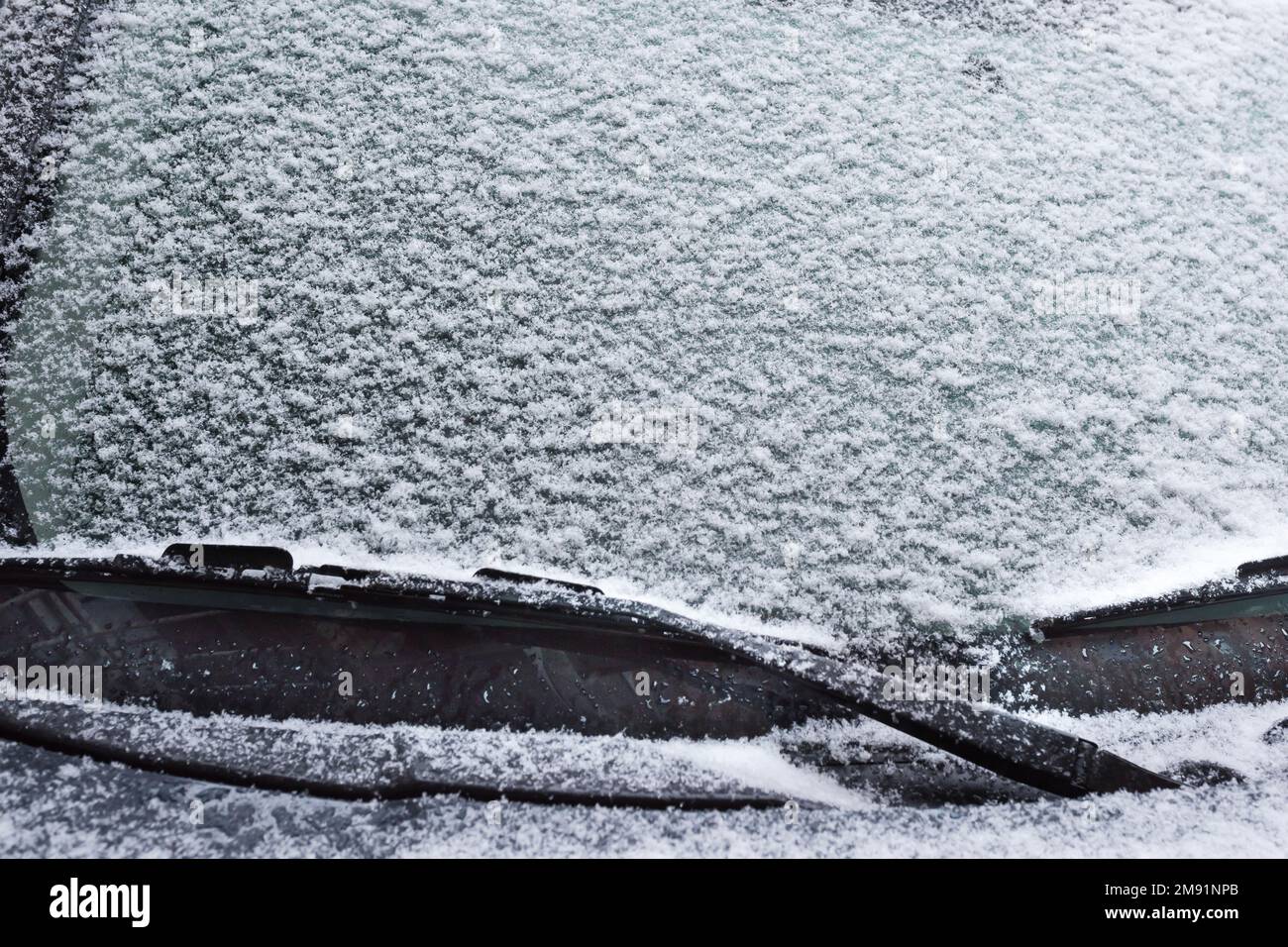 Winter frozen back car window, texture freezing ice glass background ...