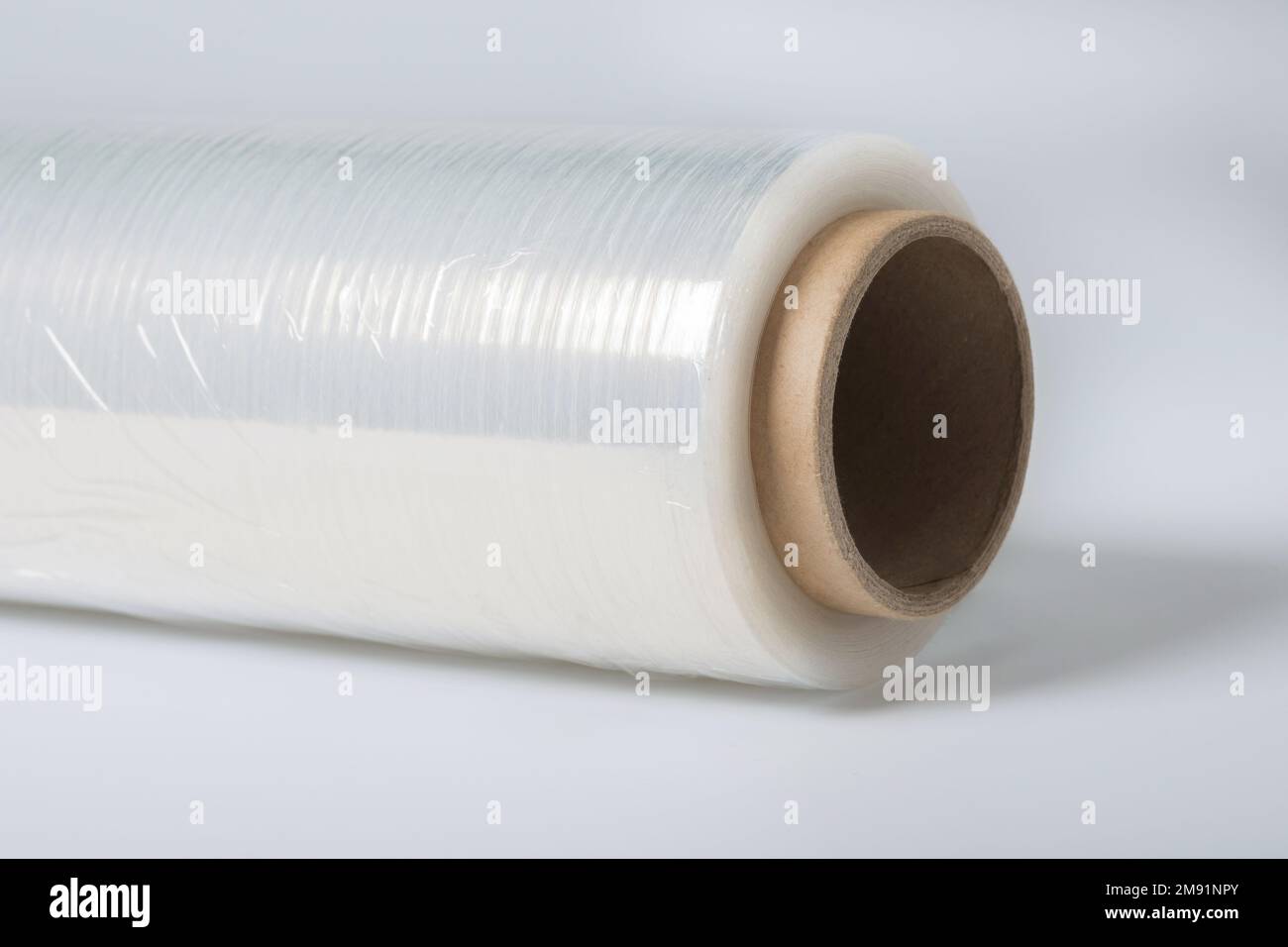 Roll of wrapping plastic stretch film on white background with clipping ...