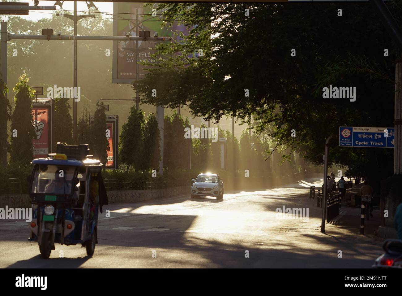 Morning yellow Sun rays striking on roads of raipur, chhattisgarh ...